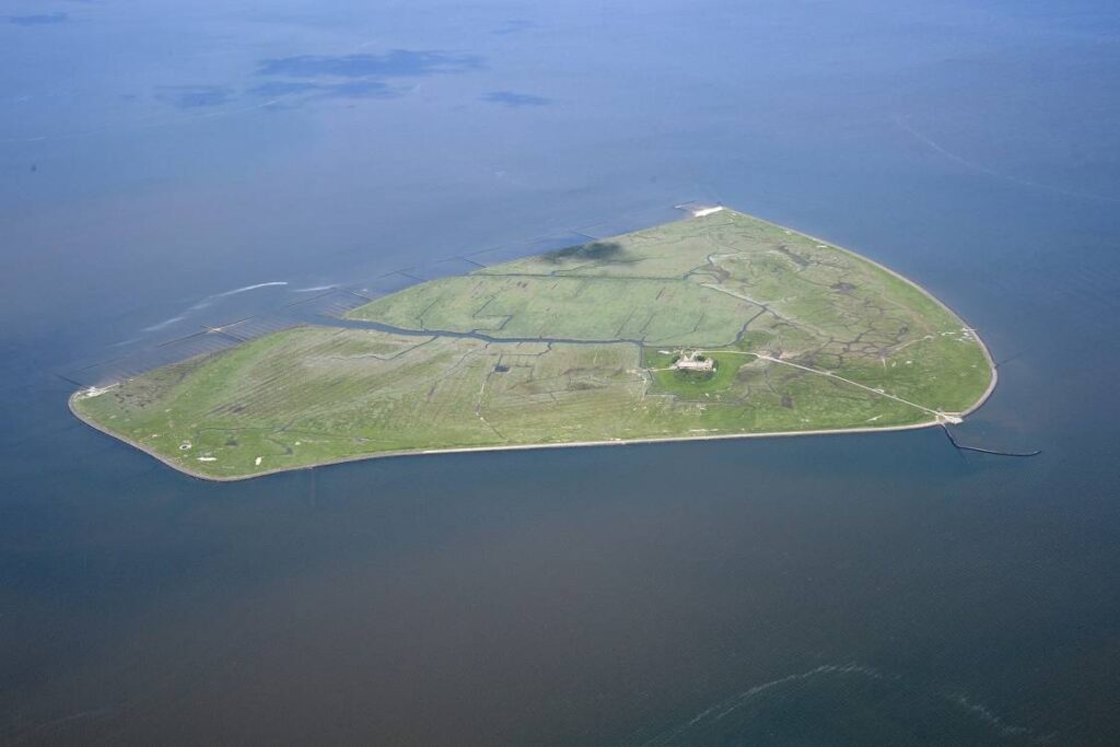 What Is a Piece of Land Surrounded by Water Called? | Free Expert Q&A ...